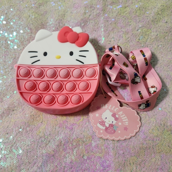 Sanrio | Accessories | Hello Kitty Pop Fidget Adjustable Strap Silicone ...